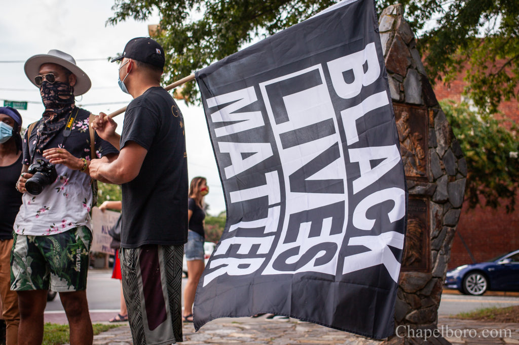 Photo Gallery: Residents Gather in Protest After White Supremacists ...