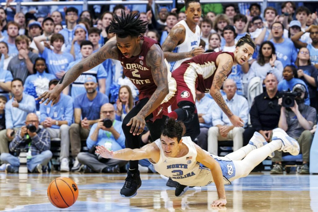 cormac ryan diving for ball unc men's basketball fsu 2023 AP Photo Ben ...