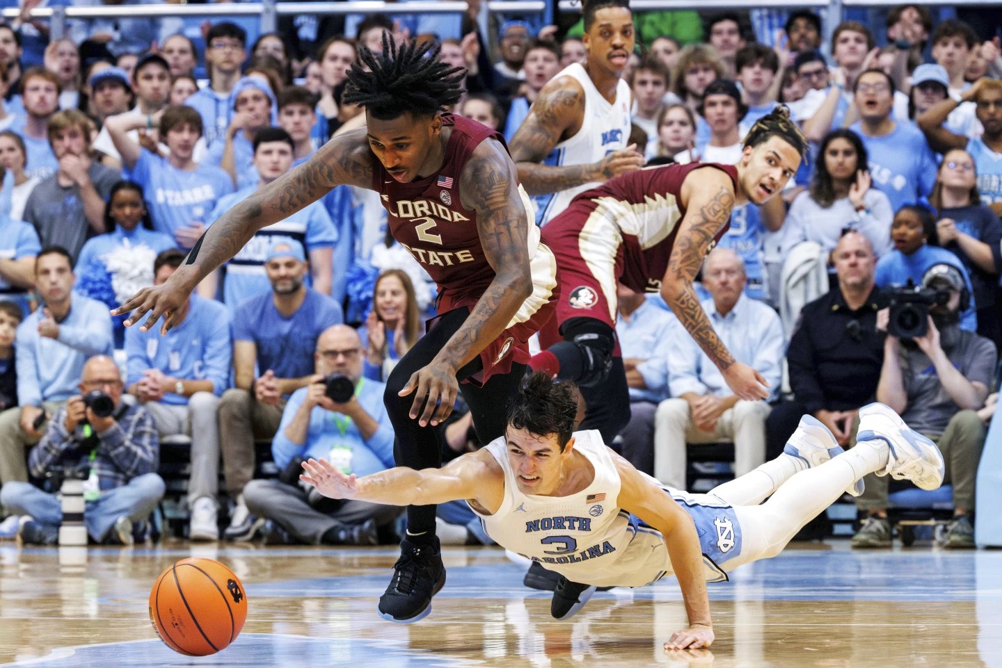 cormac ryan diving for ball unc men's basketball fsu 2023 AP Photo Ben ...