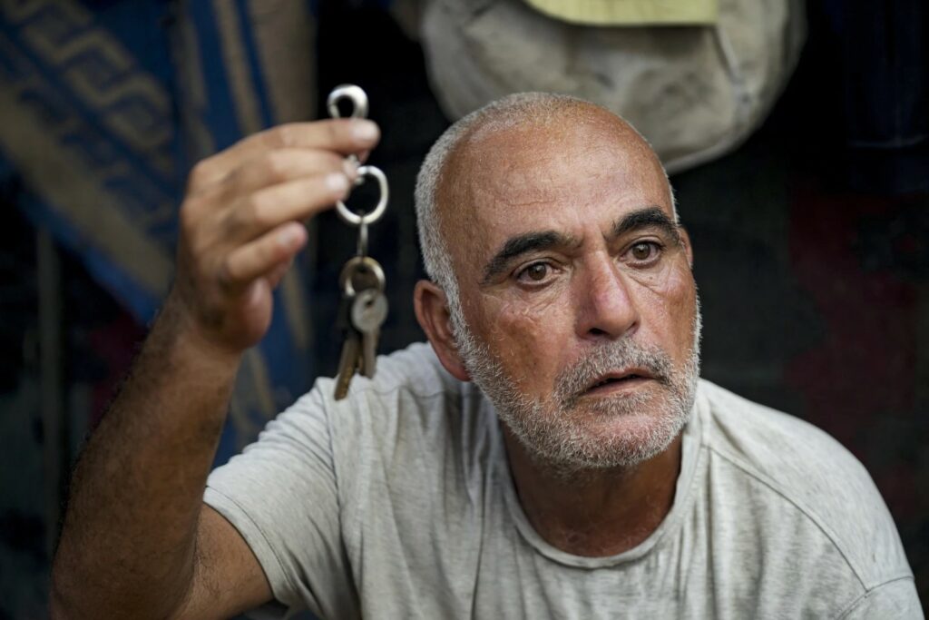 hassan nofal gaza strip house keys 7-4-24 AP PHOTO Abdel Kareem Hana ...